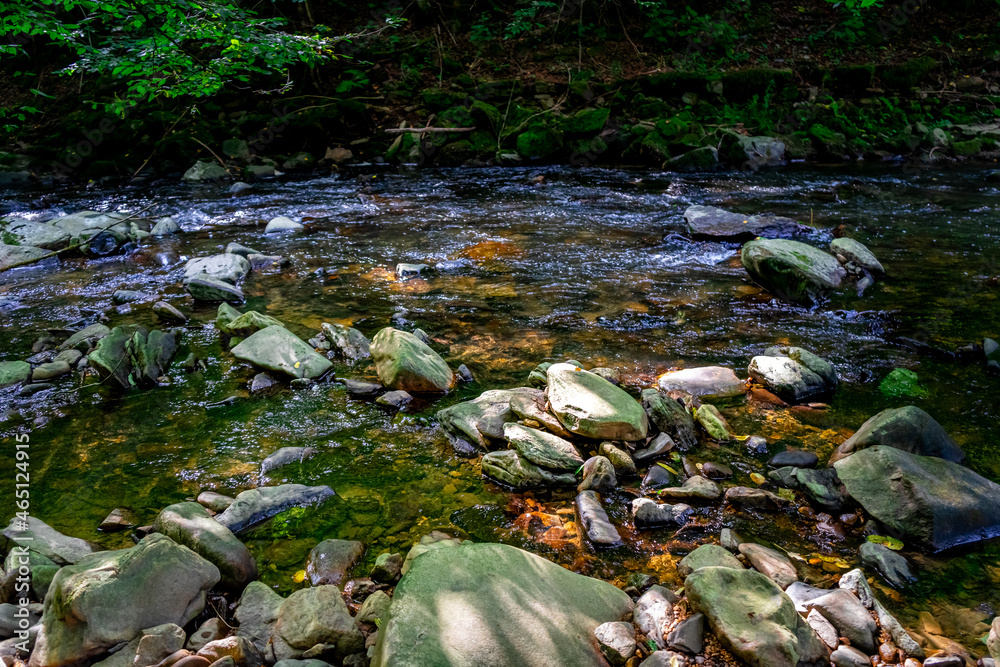 Hiking through the Valley of the Snakes near Fattendorf in the Bavarian ...