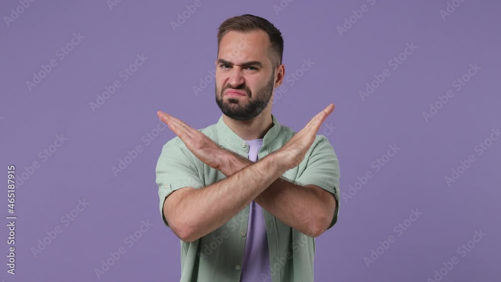 Serious strict severe exhausted angry young bearded man 20s years old ...