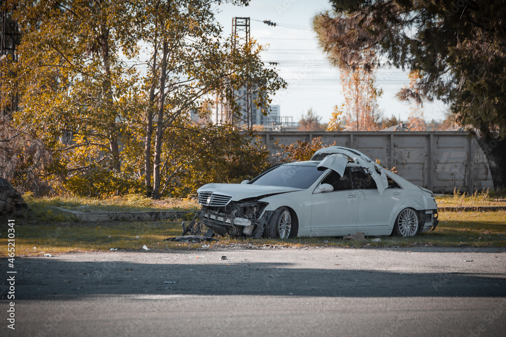premium car after an accident is on the side of the road, a broken car ...