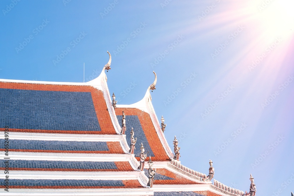 The roof of the temple or the roof of the church is lit by sunlight ...