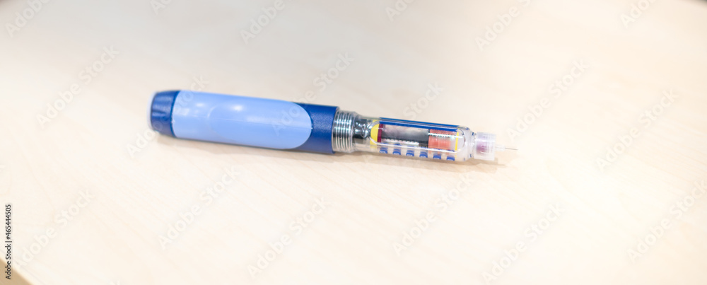 Insulin pen with insulin drop at needle with the box, the equipment for ...