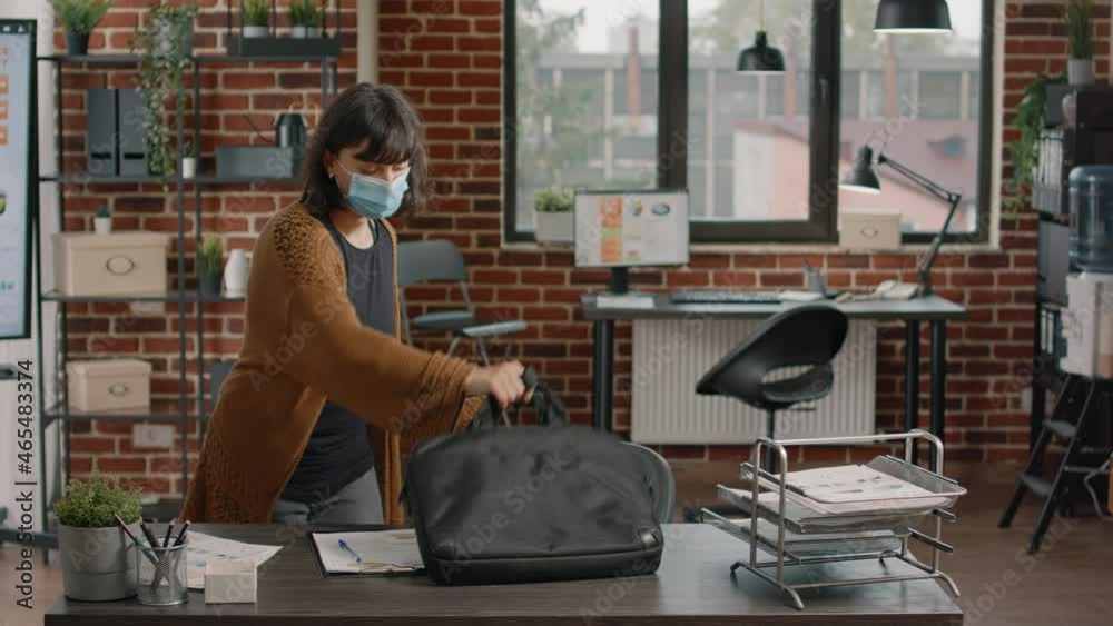 Vídeo do Stock: Employee arriving at startup job and preparing laptop ...