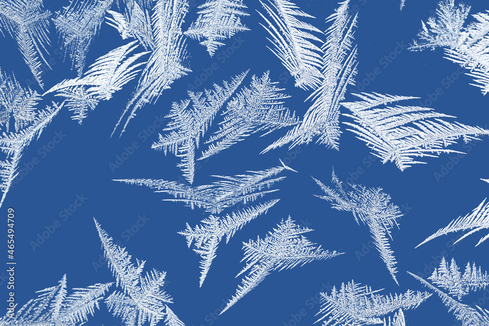Beautiful frost patterns in the ice feather shape on frozen window as a ...