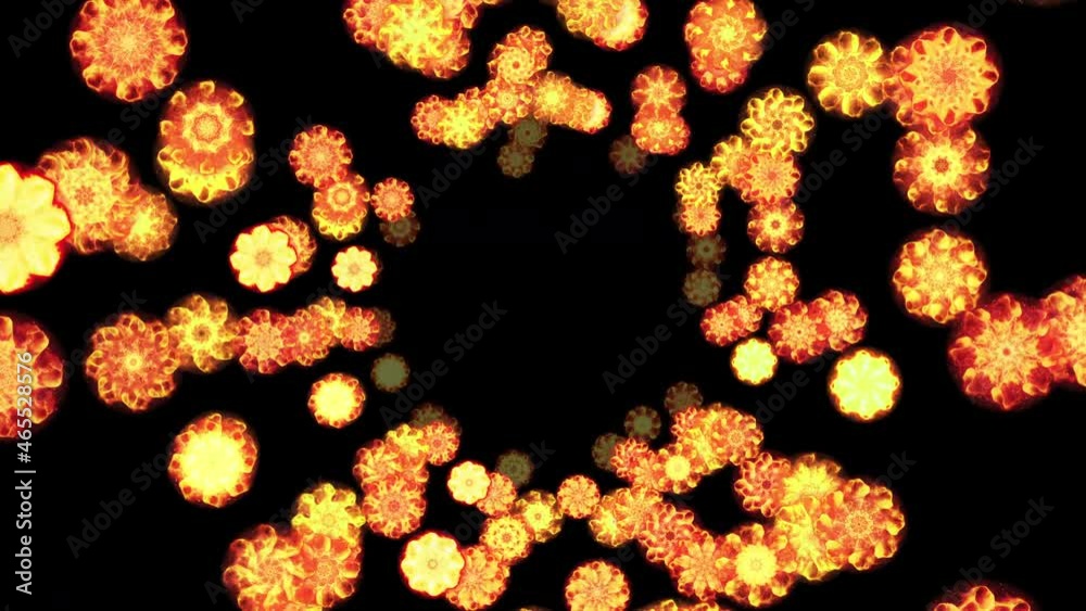 Fire flower floating in air on black background. Shape of an abstract ...