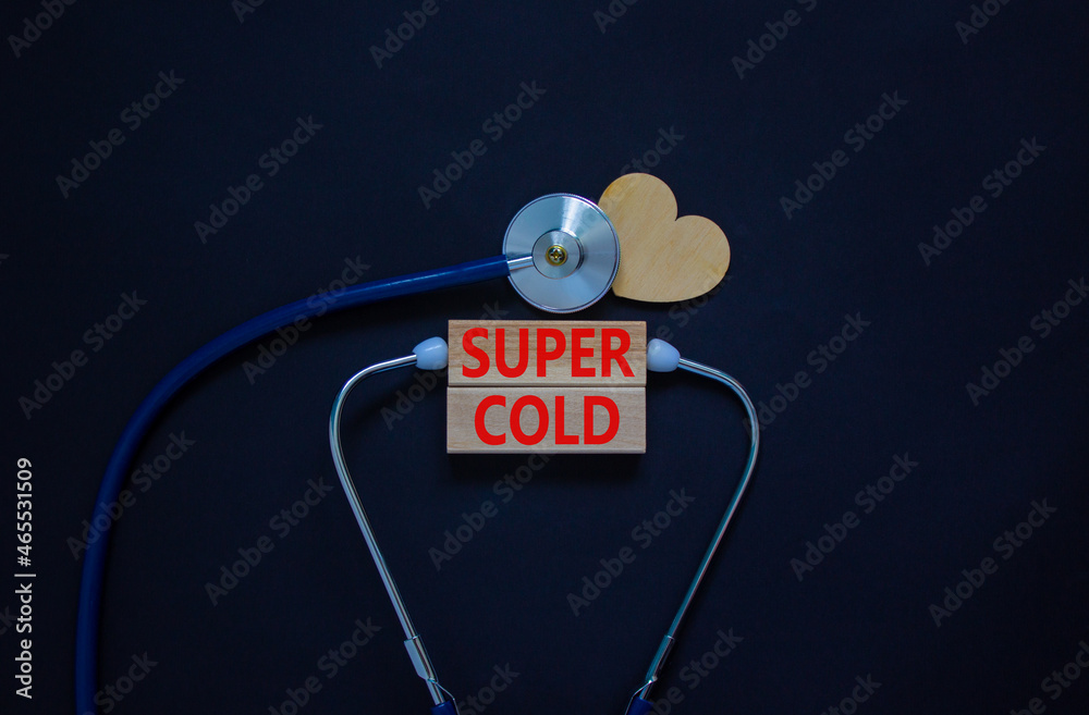 Super cold symbol. White card, words Super cold. Wooden heart and ...