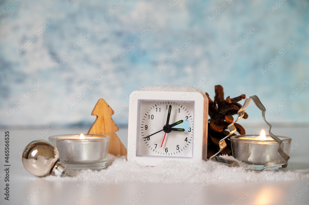 Changing to winter time, modern alarm clock showing the hour switch ...