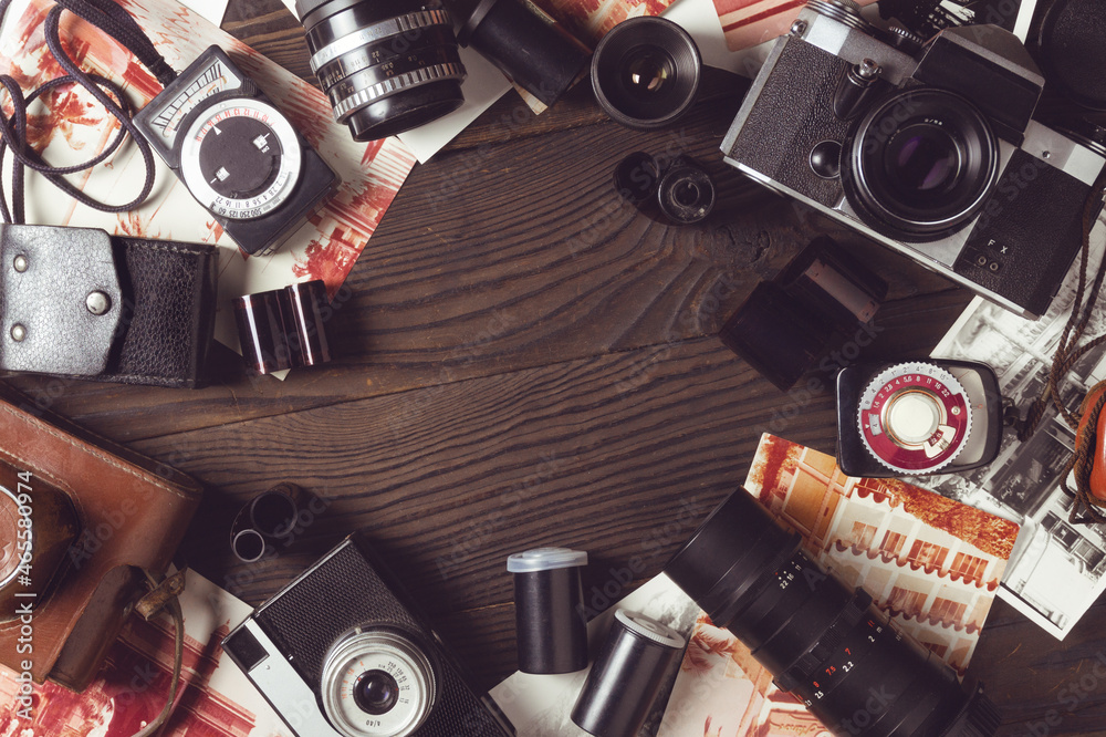 Old outdated cameras, lenses and exposure meters Stock Photo | Adobe Stock
