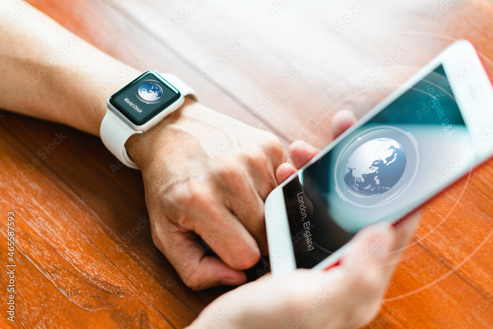 Close-up of a smart watch with the time on the world clock shown on the ...