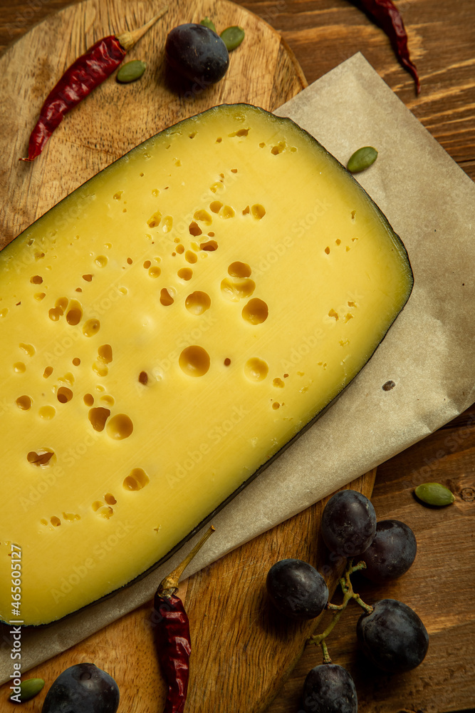 composition of different types of sliced cheese: hard, mature, cheese ...