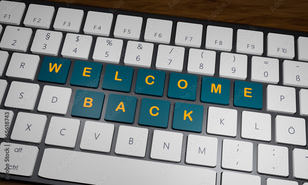 Welcome Back. Written in orange on dark green keys of a computer ...