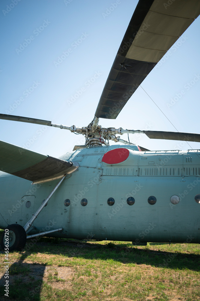 Old helicopter. Hull, chassis and propellers of an old helicopter ...
