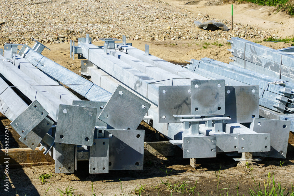 stack of galvanized metal structures on the ground at the construction ...