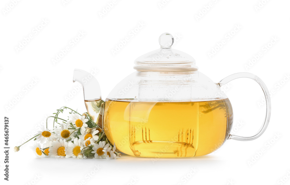 Teapot of tasty tea with chamomile flowers on white background Stock ...