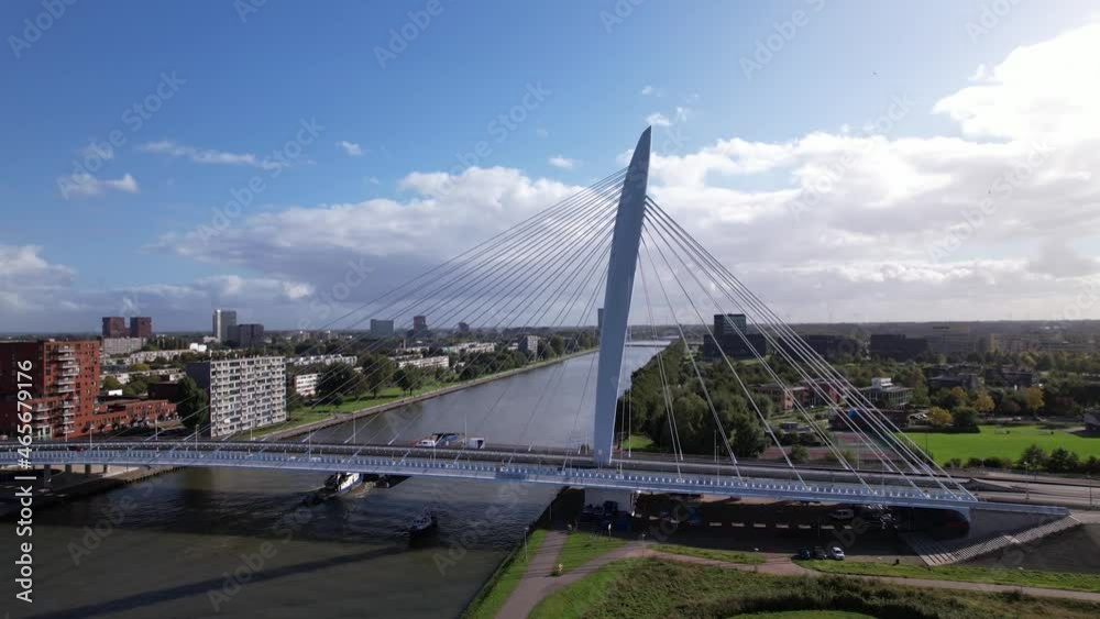 Sideways pan showing the Prins Clausbrug cable bridge city access to ...