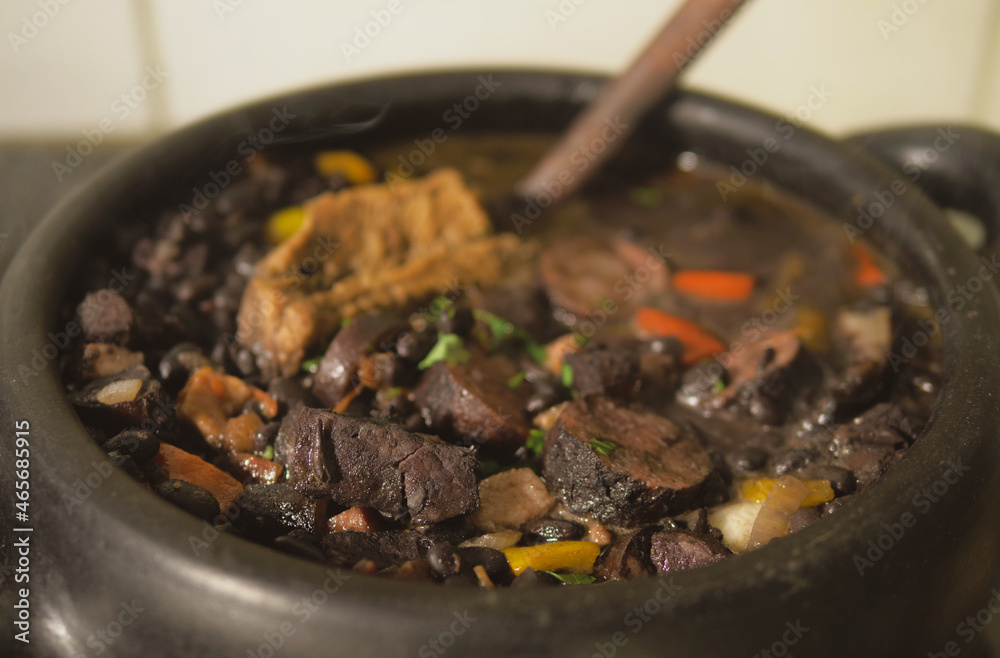 Cooking feijoada on a wood stove Stock Photo | Adobe Stock