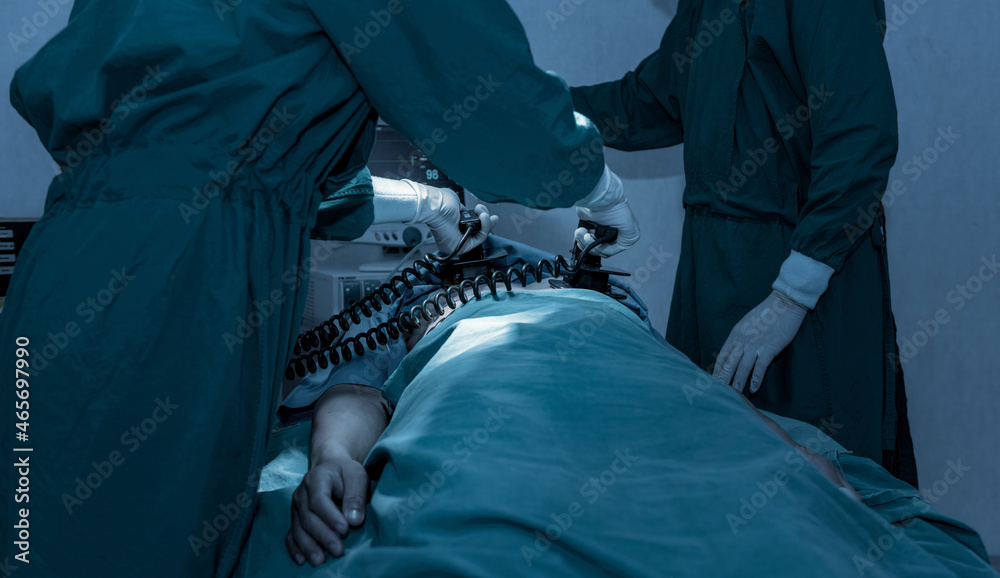 Doctor wearing safty uniform and medical glove, doctors use medical ...