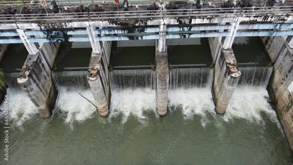 An aerial view of a small dam in rural Thailand. Water resources for ...