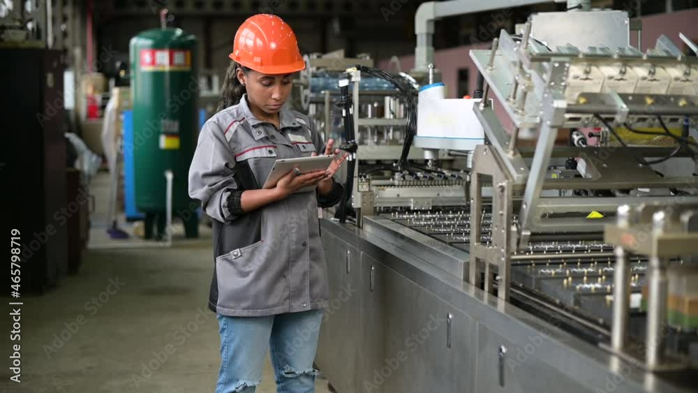 Video „Portrait of a young black woman while working in production ...
