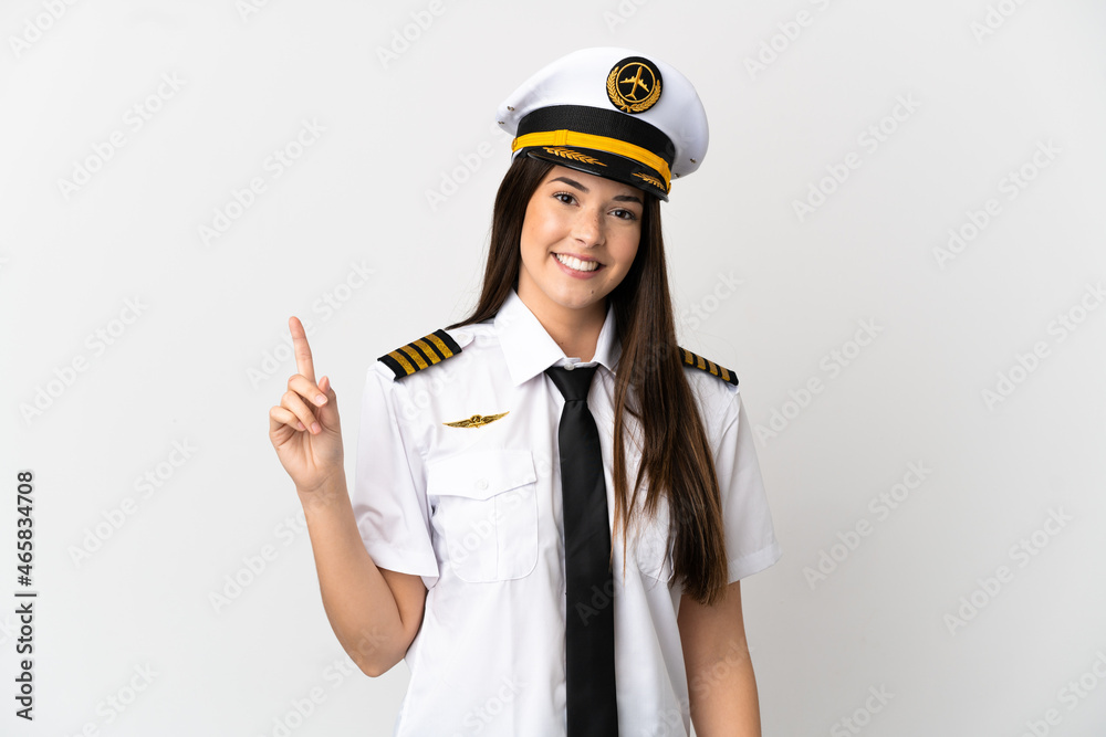 Brazilian girl Airplane pilot over isolated white background showing ...