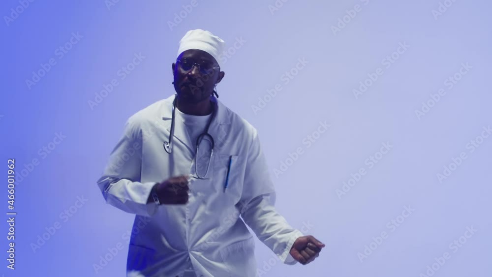 African american happy doctor dancing. Health staff worker having fun ...
