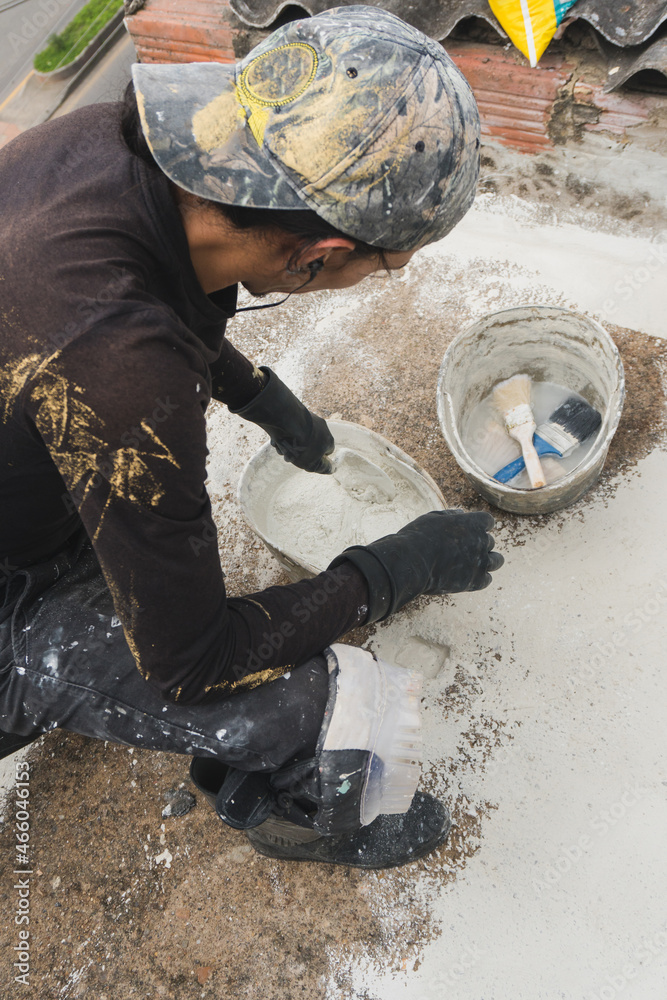 man remodeling his house. arrangements and details of work. person ...