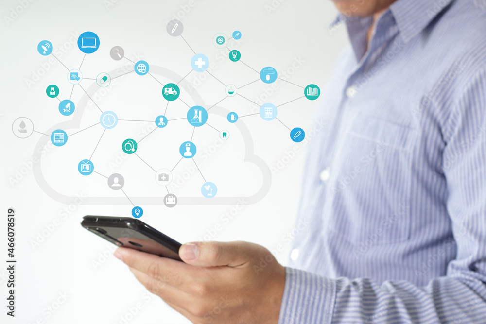 Man holding smart phone with virtual cloud computing on hand with connection line.Cloud ...