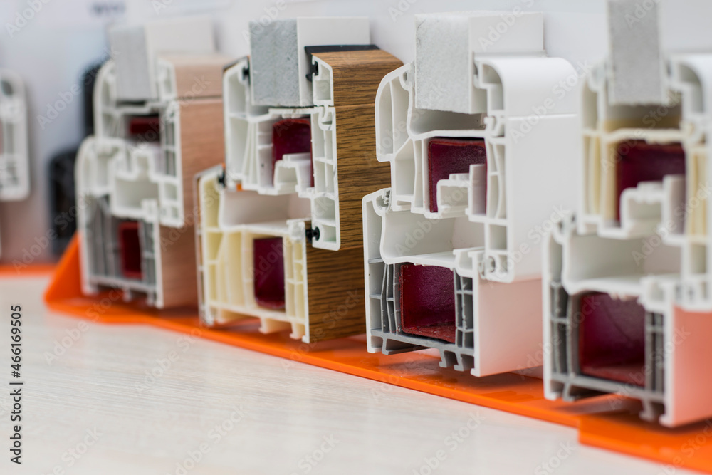 Exhibition samples of plastic window profiles. Window profile section ...