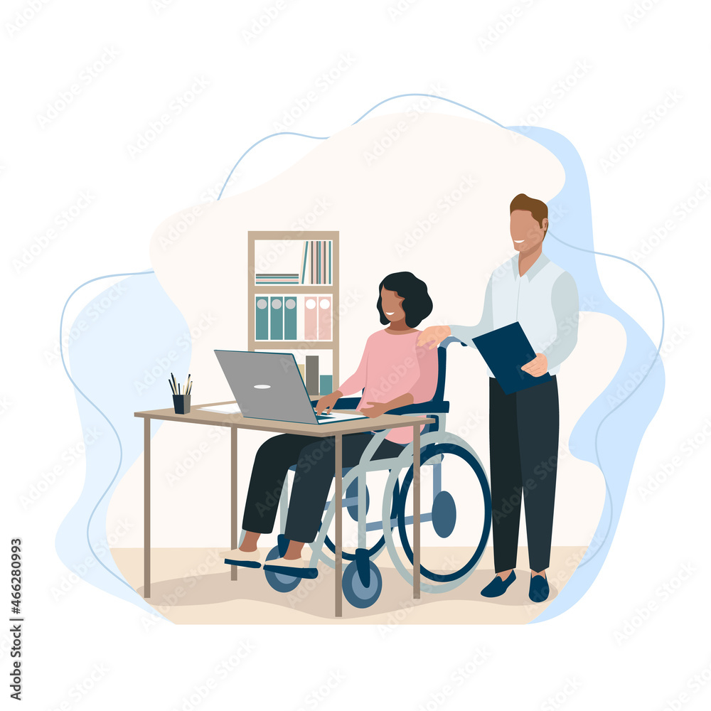 Disabled girl in a wheelchair works at a laptop in the office ...