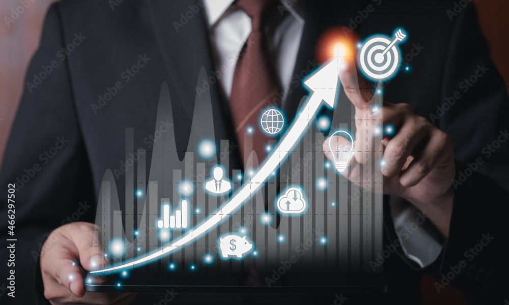 Businessman holding tablet and Draw Business Analysis Concepts and ...