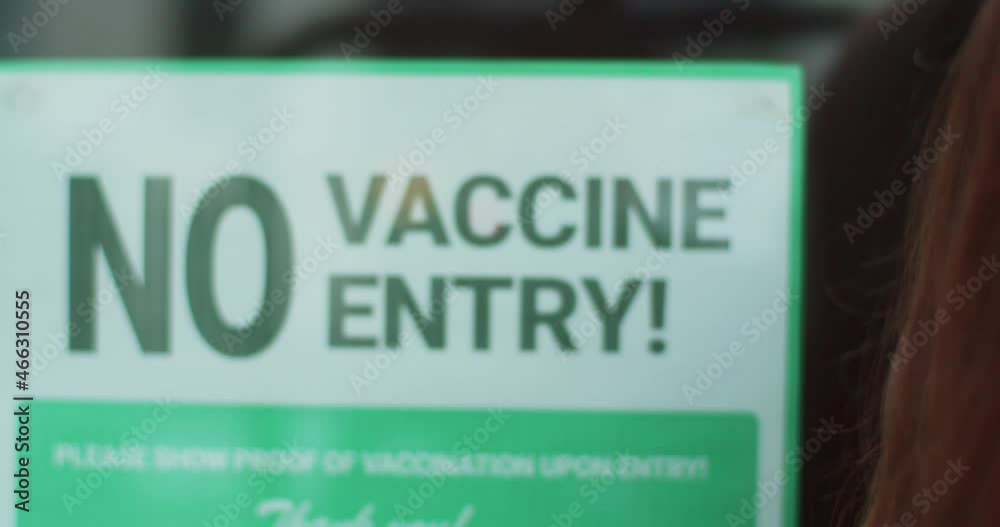 Vaccinated person using digital health passport app with covid-19 ...