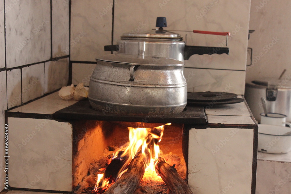 Making food in a wood burning stove! Stock Photo | Adobe Stock