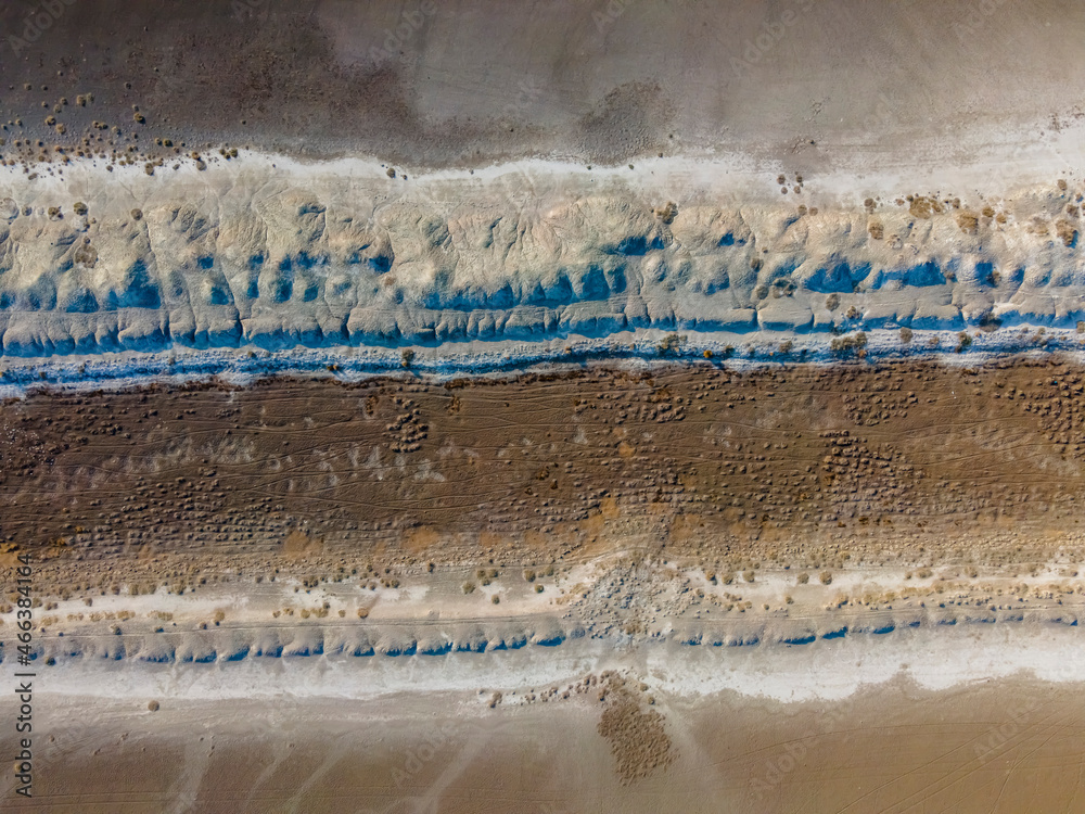 Aerial view of a dried-up riverbed as a result of global climate change ...
