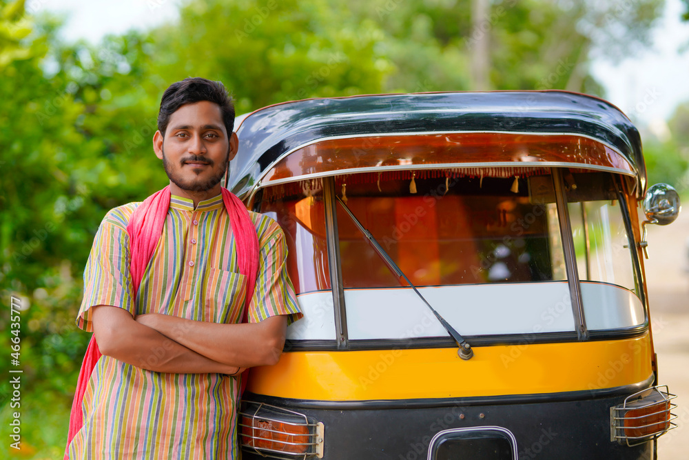 Indian auto rickshaw three-wheeler tuk-tuk taxi driver man Stock Photo ...