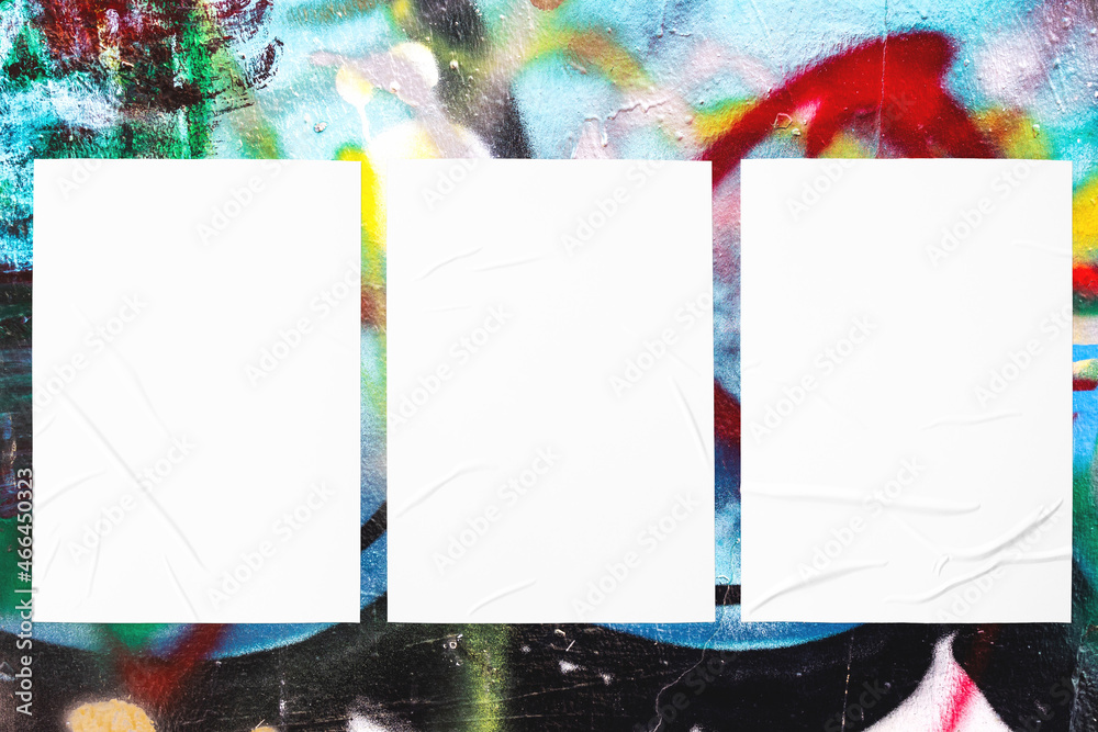 Closeup of colorful messy painted urban wall texture with three ...