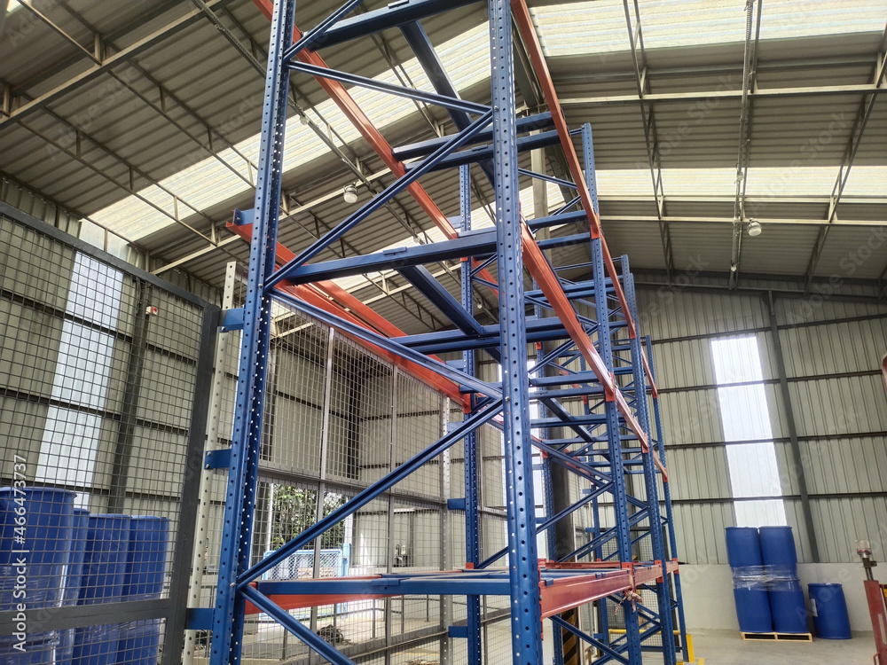 Close-up shot of empty blue storage pallet racks for storing goods in ...