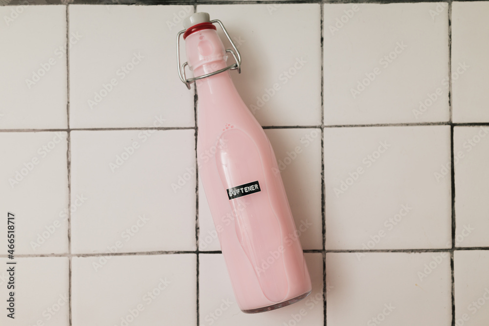Single DIY pink detergent in a glass bottle with an embossed black ...