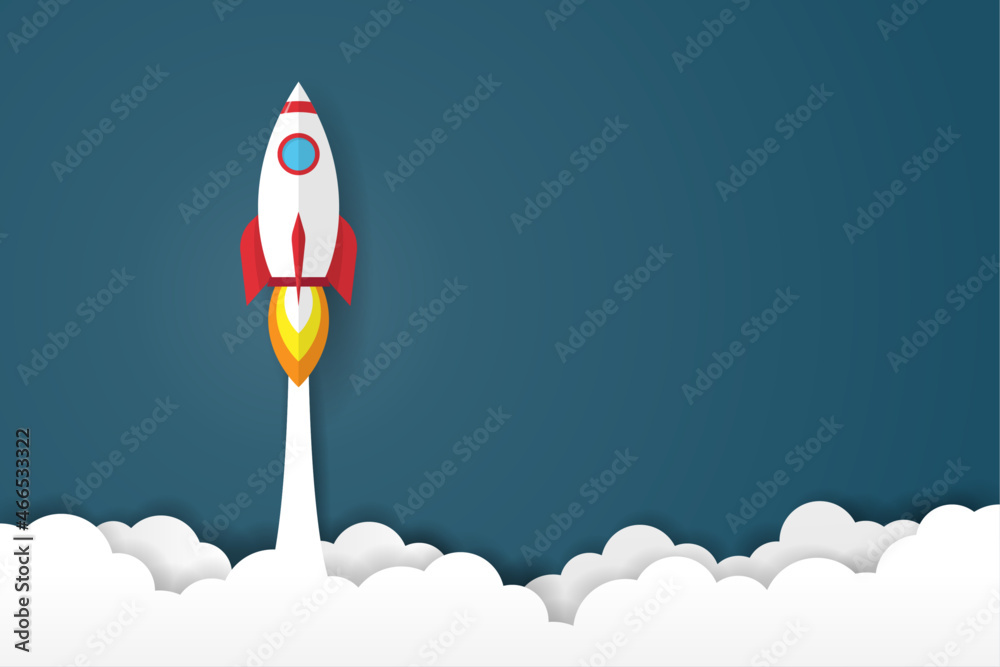 rockets launch into the night sky with stars and clouds on background ...