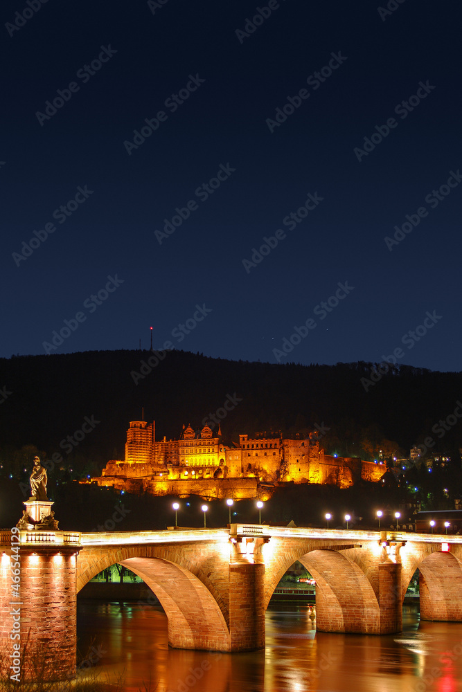Cover page with stunning reddish night illumination over the old town ...