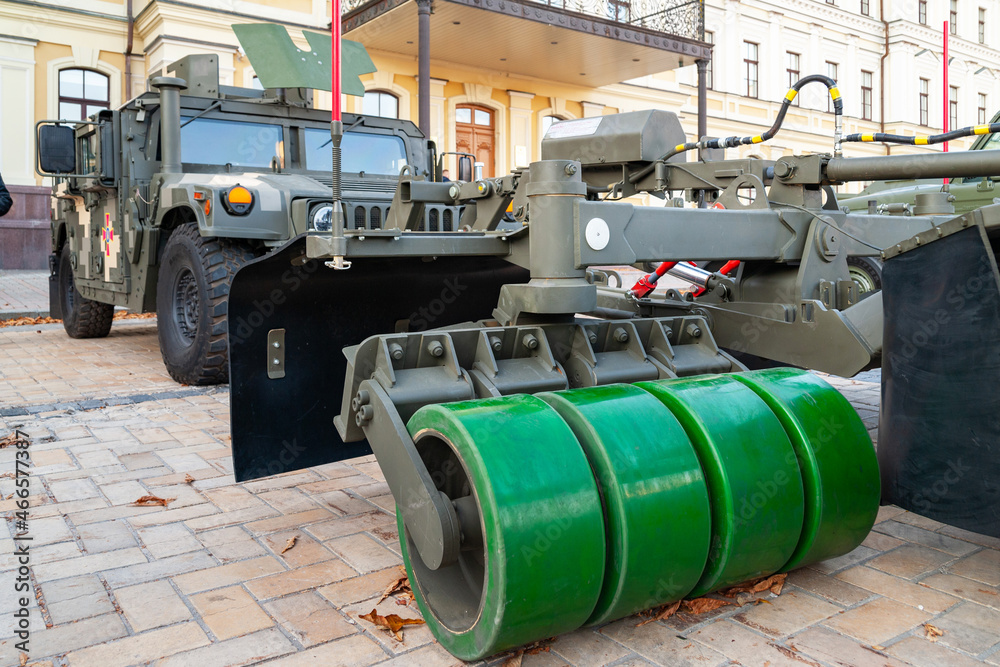 A mine clearance vehicle HUMVEE (HUMMER) with a trawl of the Ukrainian ...