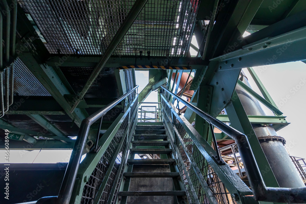 Industrial old blast furnace with pipelines and chimney in germany ...
