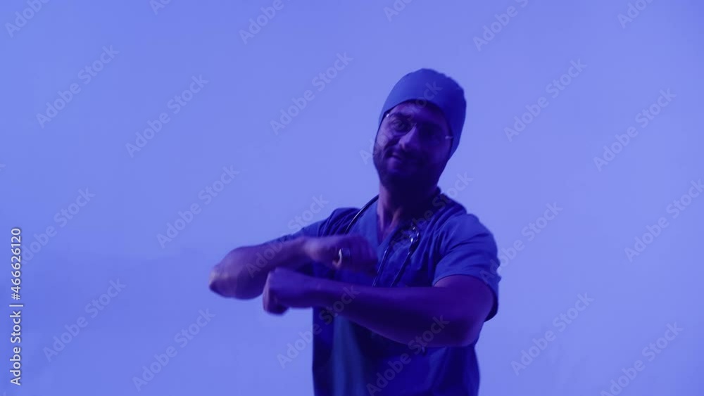 Happy doctor dancing. Professional medical worker having fun on ...