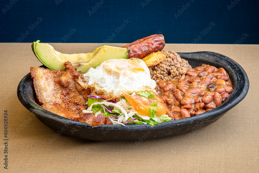 bandeja paisa beans sausage egg chicharron salad rice avocado Stock ...