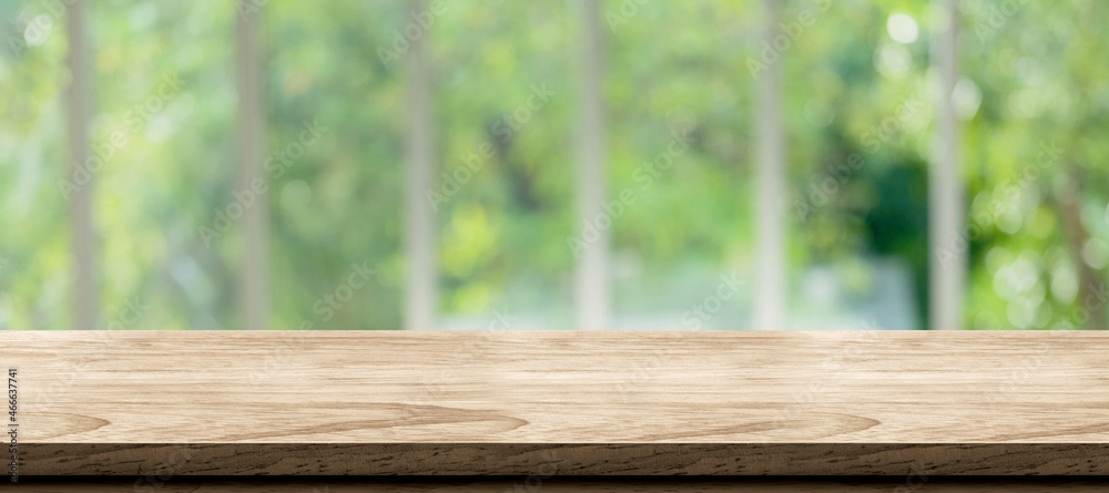 wooden table background with blur window see through garden at home ...