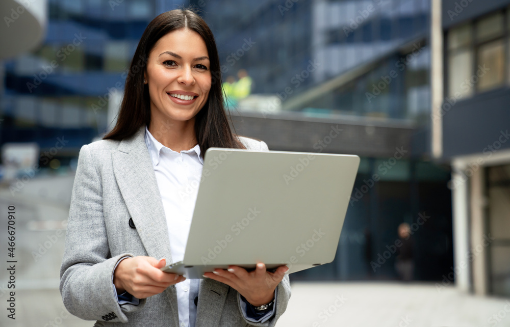 Beautiful business professional woman in the city outdoor. Business ...