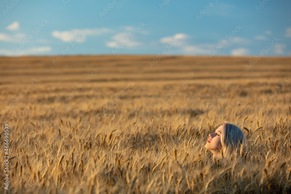 Blonde woman without clothes in wheat field in sunset time Stock Photo ...