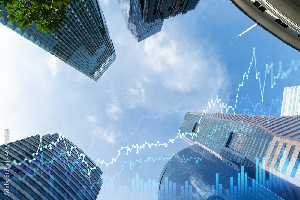 Forex and stock market chart hologram over low angle shot of Singapore ...