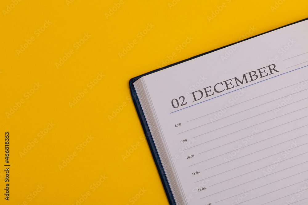 Notepad or diary with the exact date on a yellow background. Calendar ...