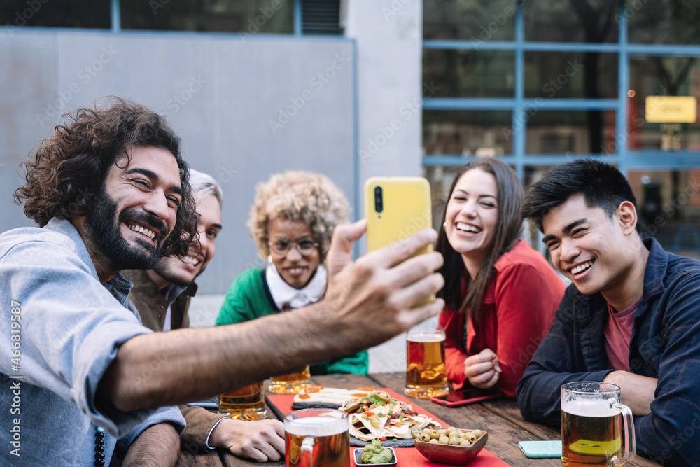 Group happy friends taking selfie photo in outdoors restaurant bar to ...