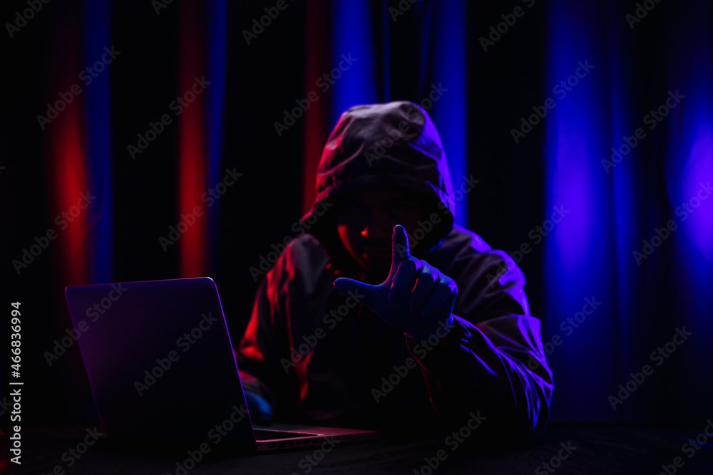 Hackers wear hoods to cover their faces. Hacking to steal important ...