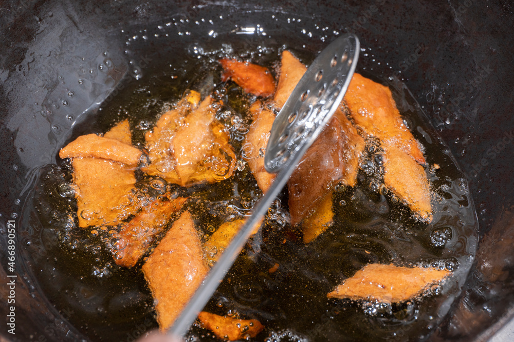 Homemade preparation of shankarpali a diamond shaped Traditional indian ...